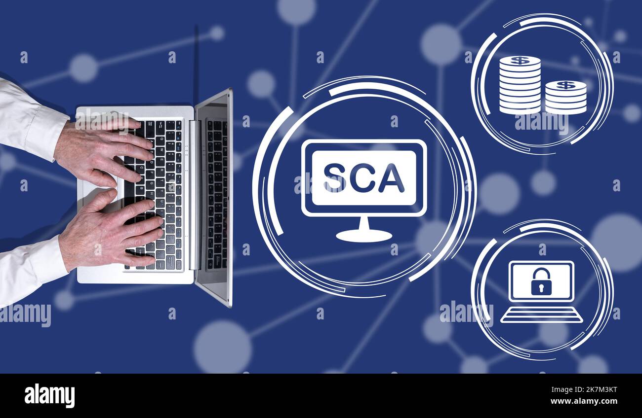 Top view of hands using laptop with symbol of sca concept Stock Photo ...