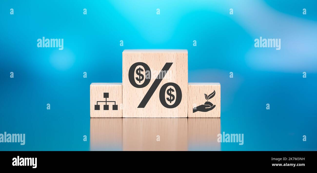 Wooden blocks with symbol of roi concept on blue background Stock Photo ...