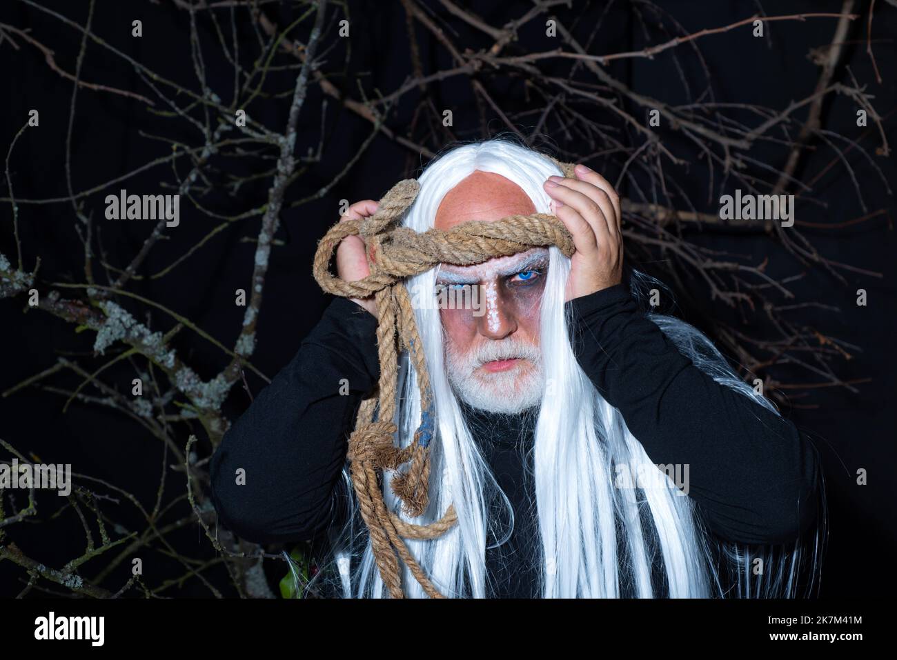 Portrait of Devil with Halloween bloody make up showing his emotions ...