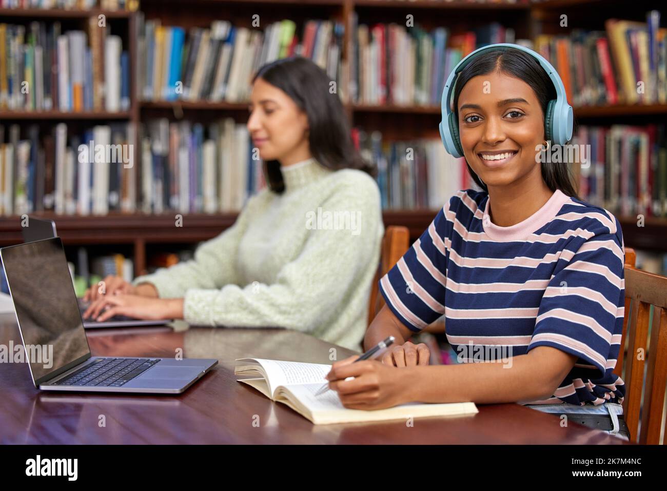 A Trained Librarian is a Powerful Search Engine. two students studying ...