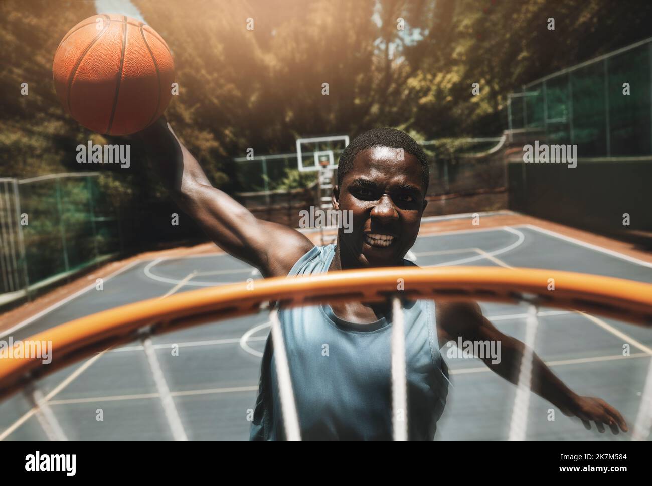 Basketball, sports goal and man training at basketball court with ball ...