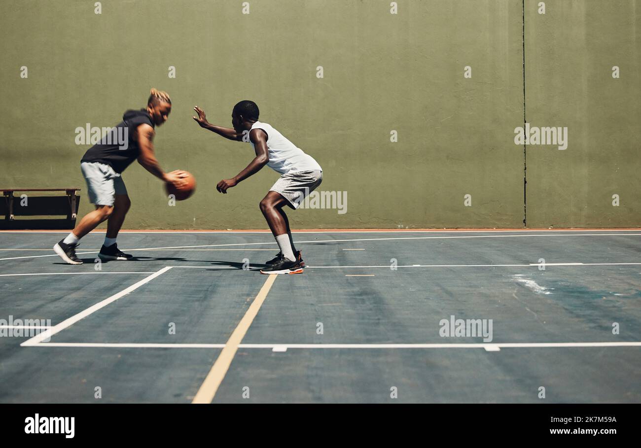 Exercise, sports and basketball friends training at basketball court ...