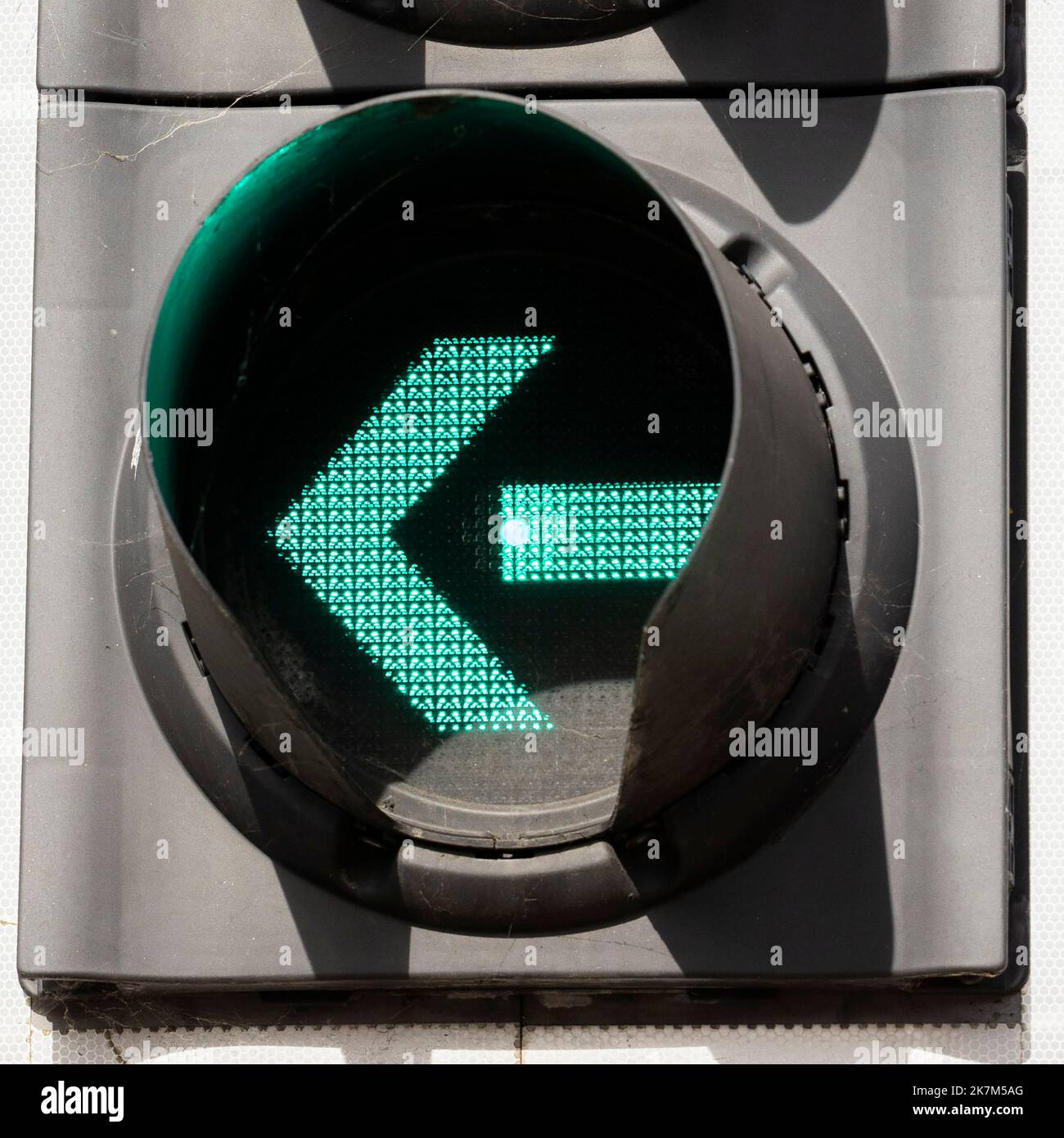 A traffic light showing a green for go arrow Stock Photo - Alamy