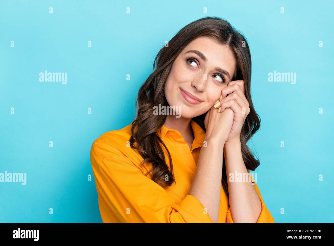 Portrait of pretty peaceful person folded arms touch cheekbone look ...