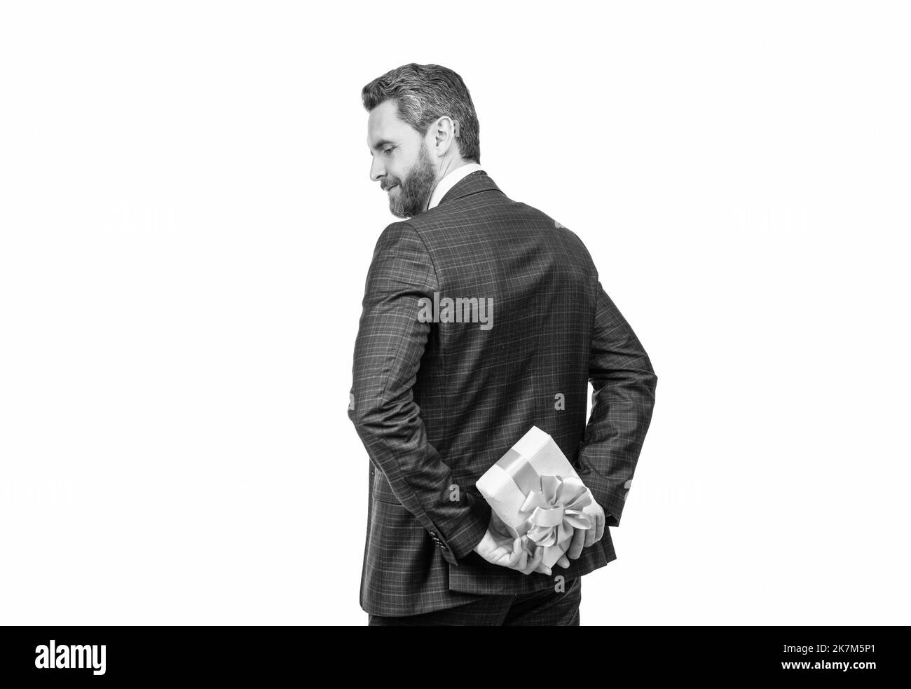 businessman man in businesslike suit hiding present box isolated on ...