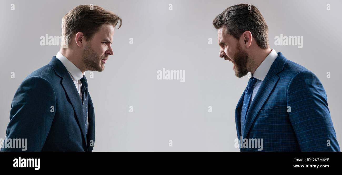 Man face portrait, banner with copy space. two angry businessmen ...