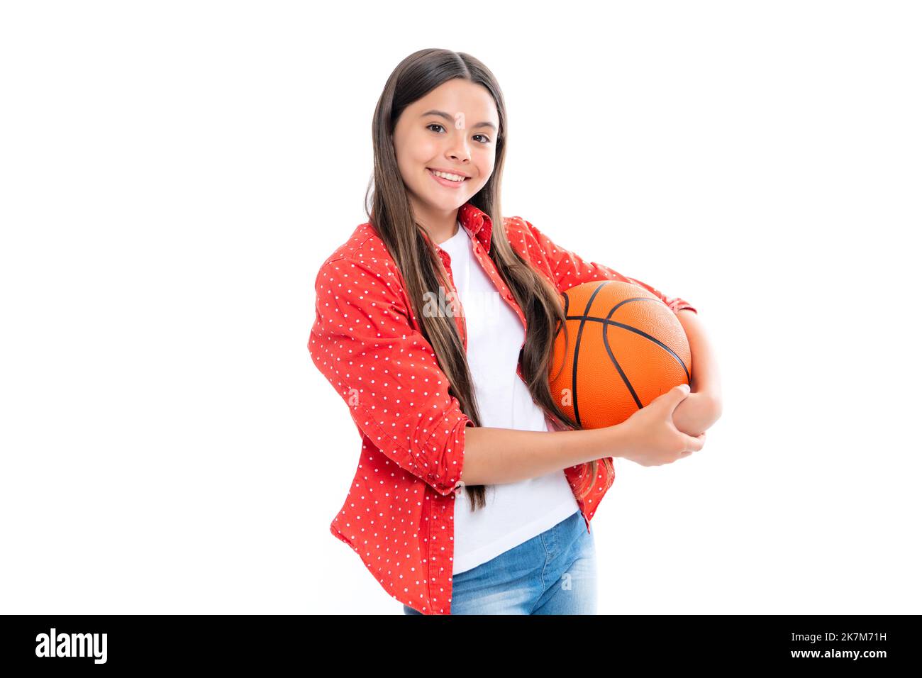 Teenage school child girl basketball player standing on white ...