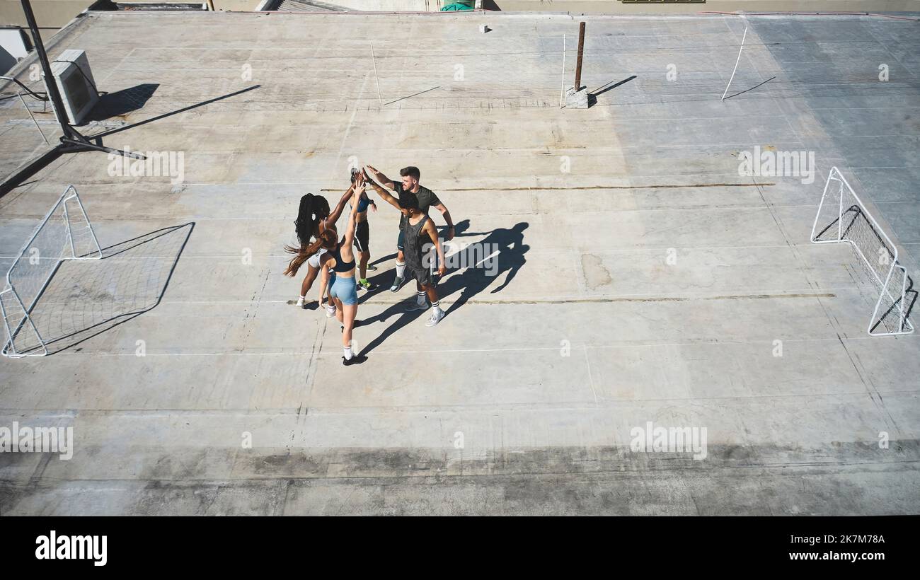 Basketball, high five and friends collaboration for sports goal with ...