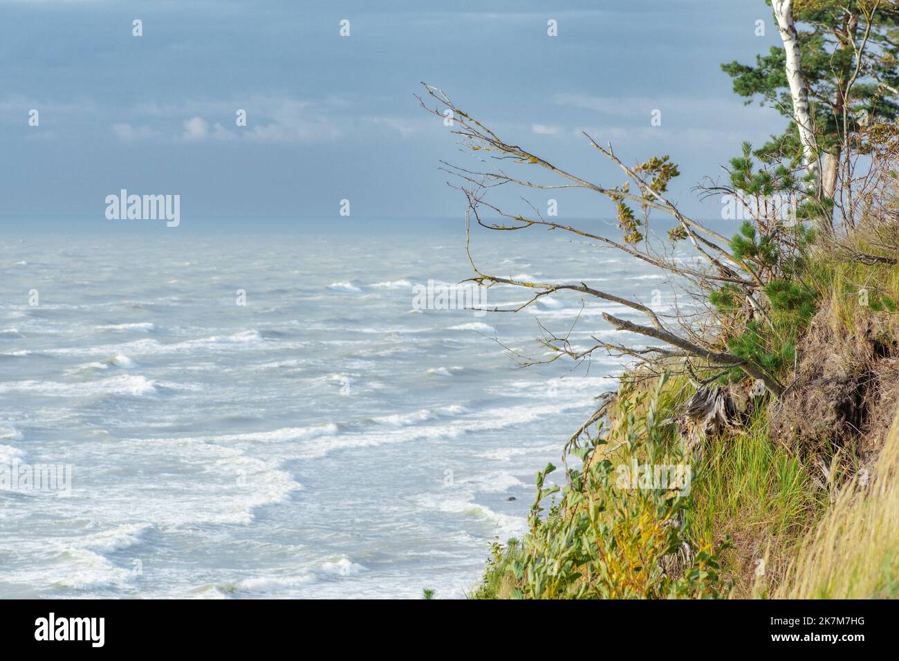 Beautiful rough grey sea with waves, dramatic cloudy grey sky with ...