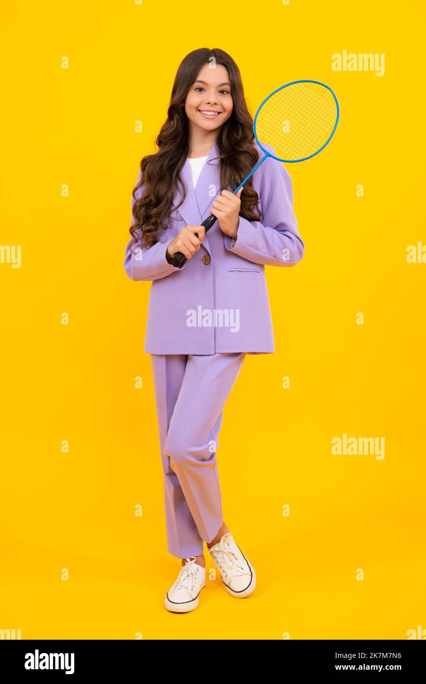Teen girl badminton player in suit with badminton racket isolated on ...