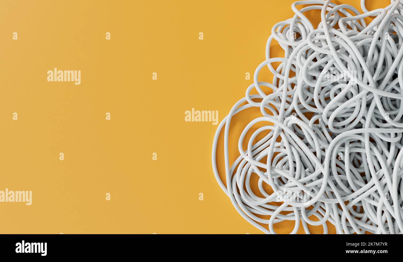 A tangled pile of string or wire. Confusion and thought process concept ...