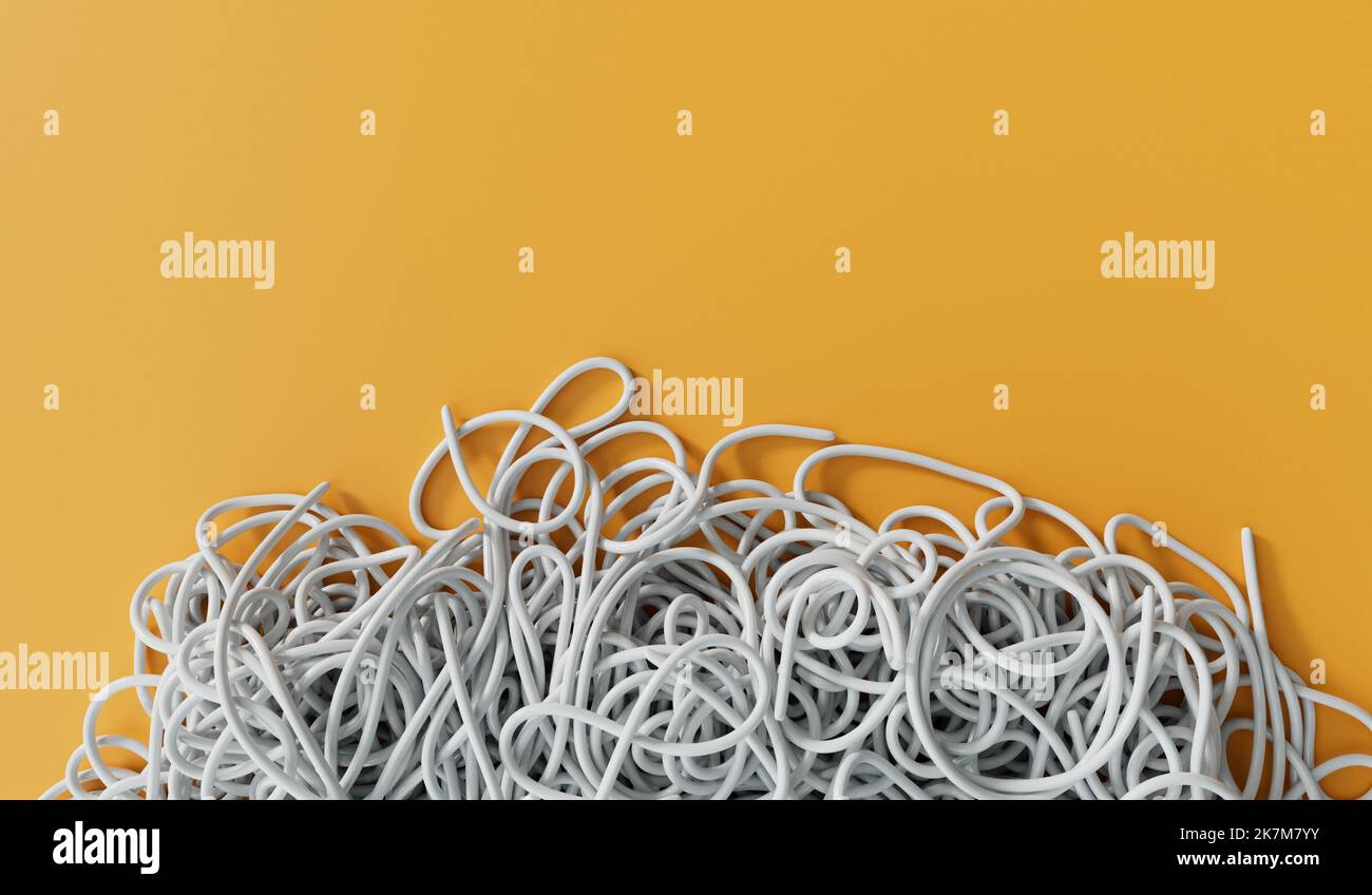 A tangled pile of string or wire. Confusion and thought process concept ...