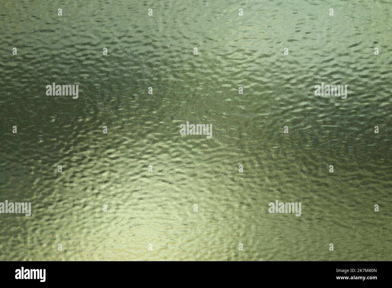 Texture of green frosted glass sheet with scratches, abstract texture ... Texture of green frosted glass sheet with scratches, abstract texture ...