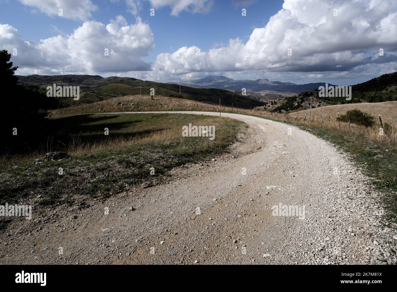landscape in light and shadow with dirt road in Sicily, Italy Stock ...