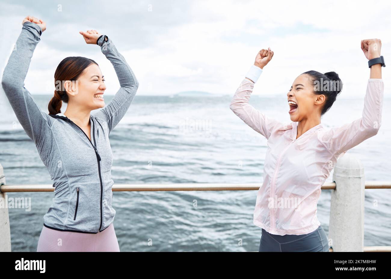 Fitness, celebration and excited girl friends cheer over exercise ...