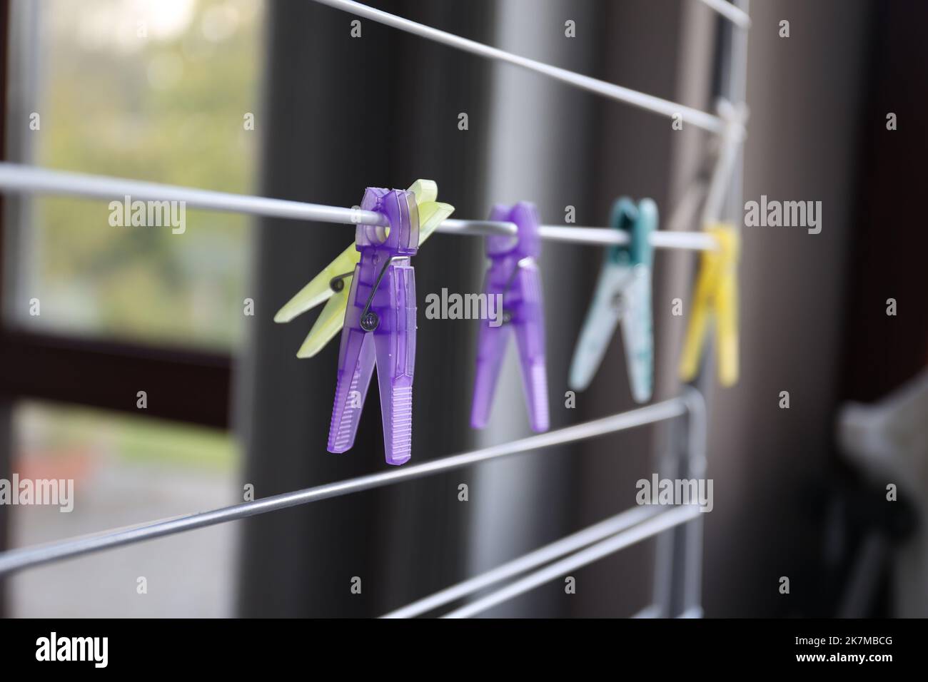 Plastic clothesline clamps hi-res stock photography and images - Alamy