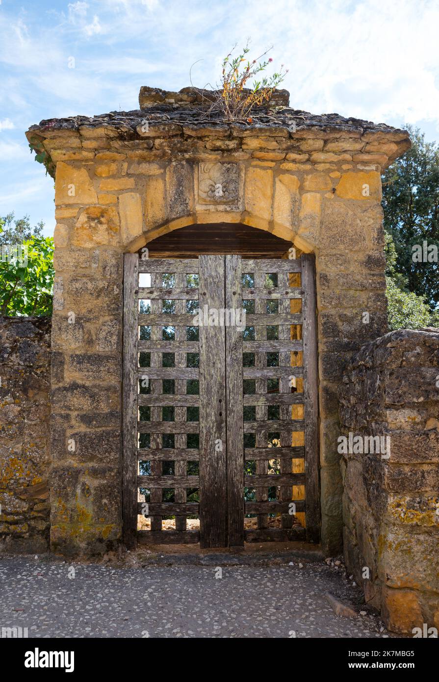 an old limestone gate in the Dordogne department of France Stock Photo ...