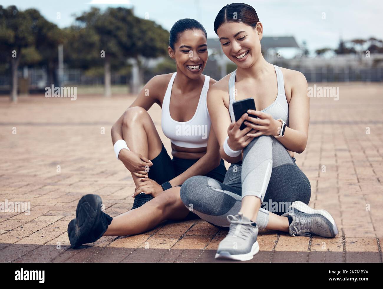 Friends, fitness app and phone of happy women on internet for social ...