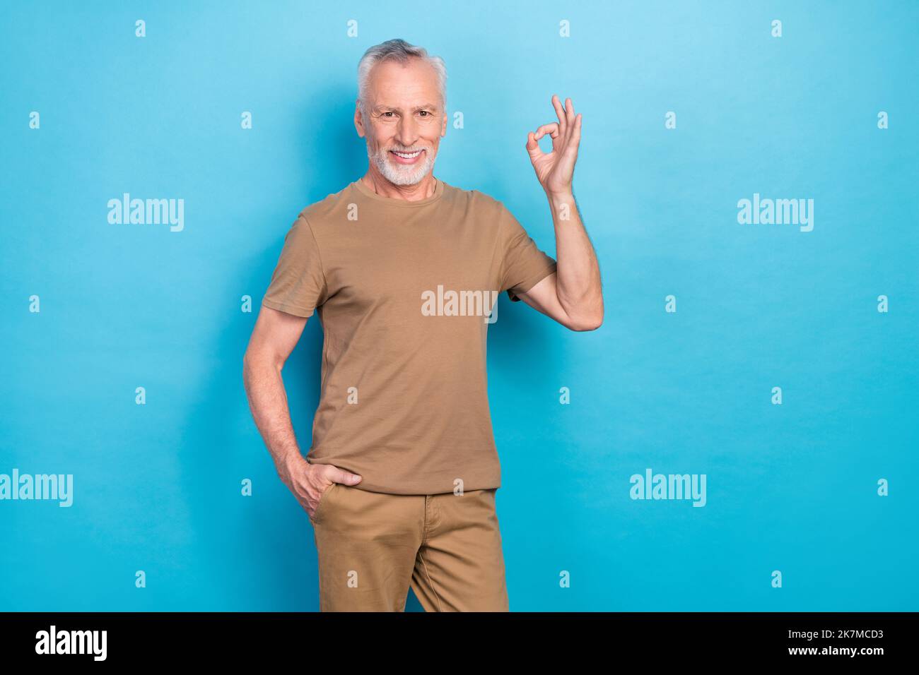 Photo of attractive virile man dressed stylish outfit arm demonstrate ...