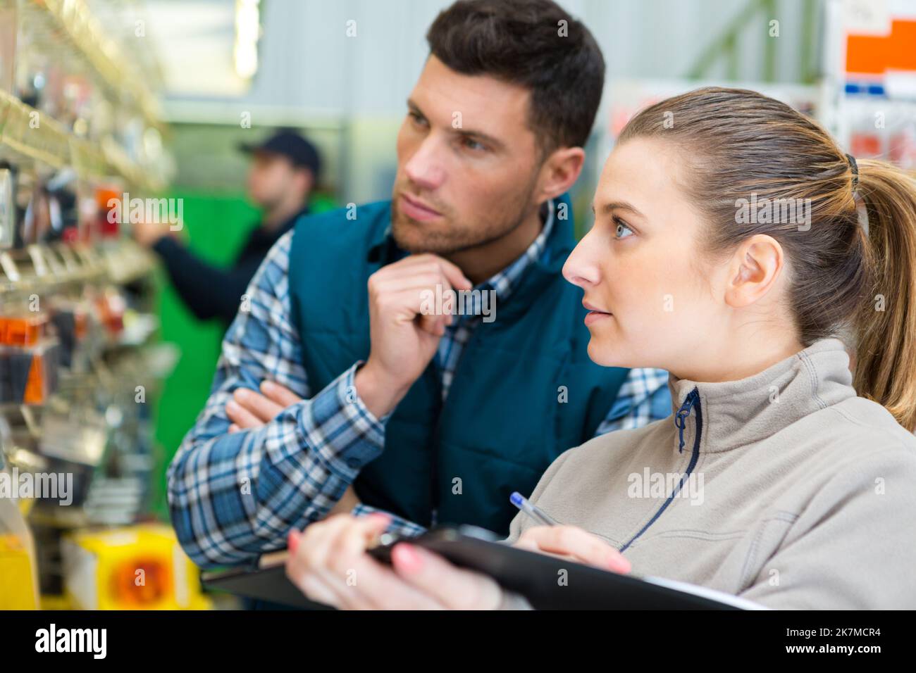 Woman buying tools hi-res stock photography and images - Alamy