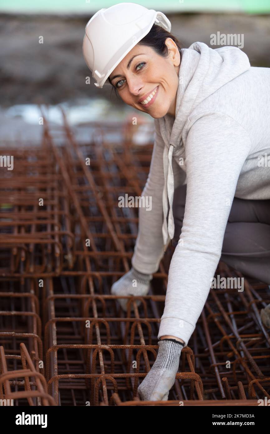 worker fixing steel rebar at building site Stock Photo - Alamy