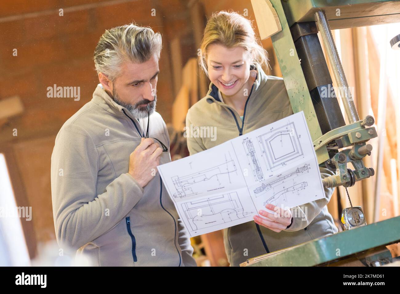 entrepreneur comparing documents Stock Photo - Alamy