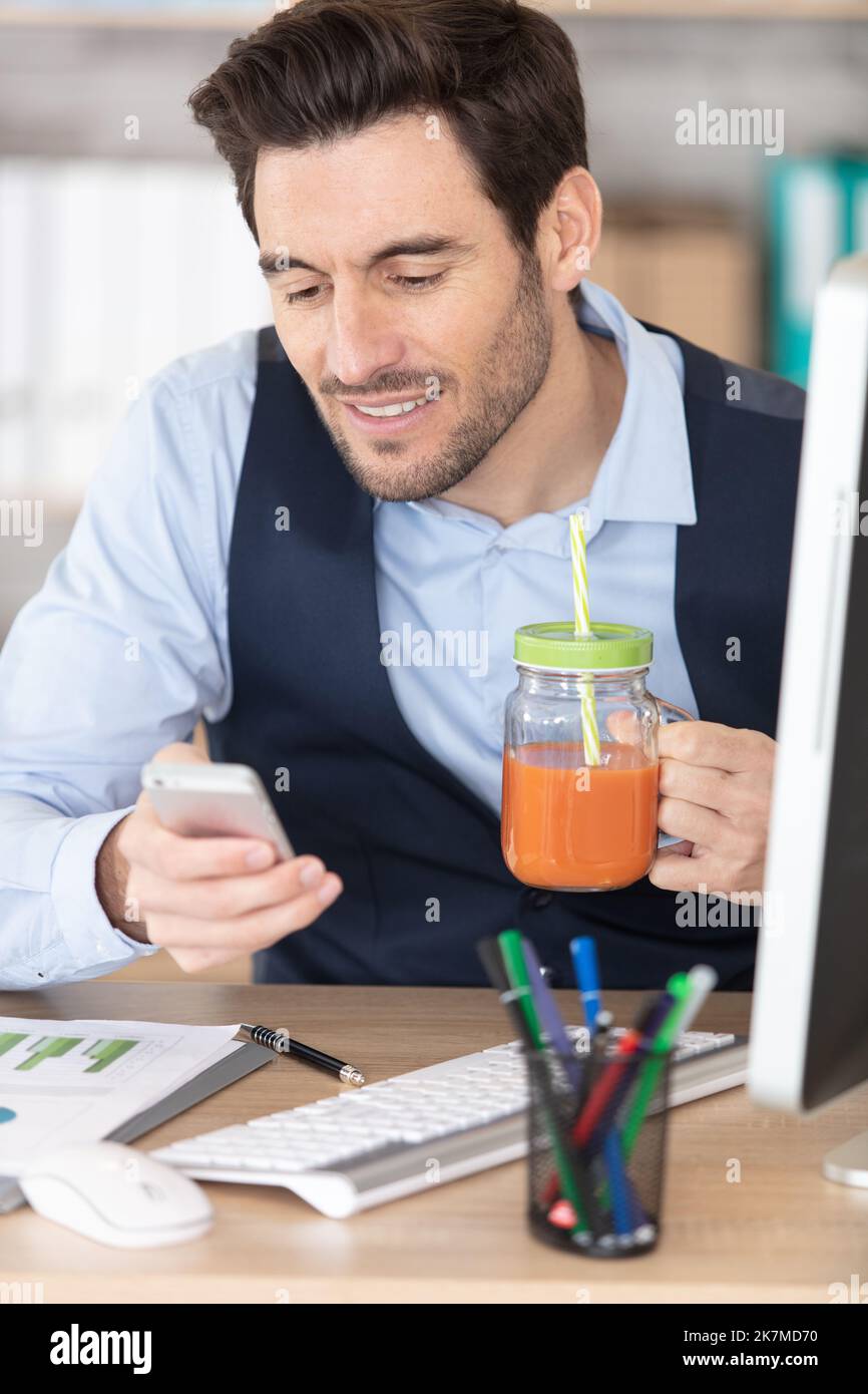 a business man breakfasts at work Stock Photo - Alamy