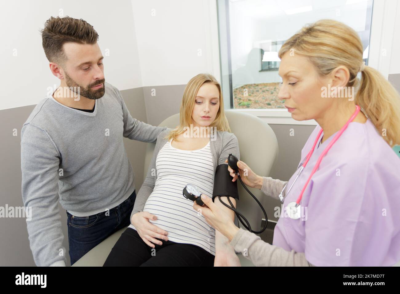 future parent with doctor at the hospital Stock Photo - Alamy