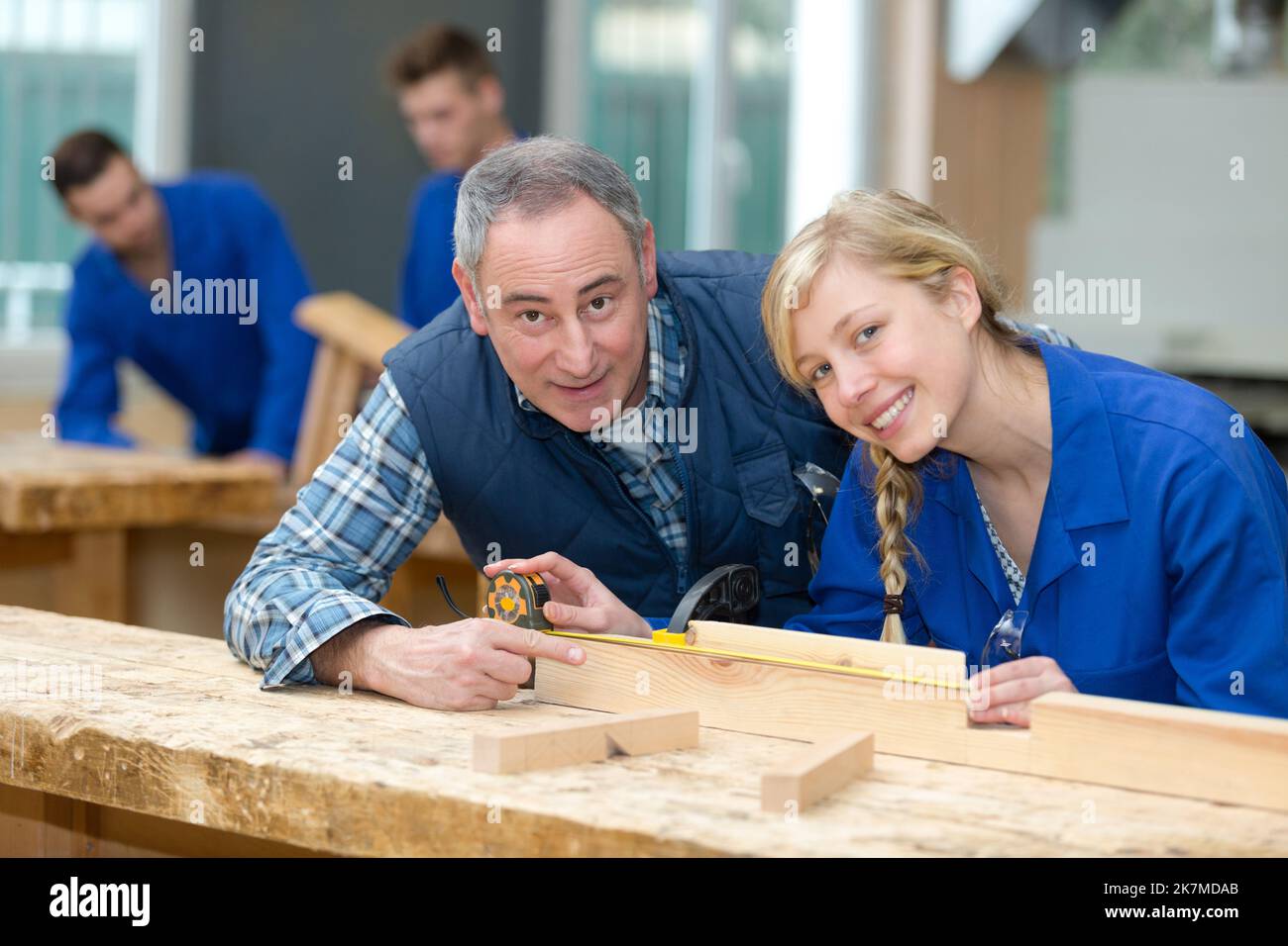 Man woman carpenter team hi-res stock photography and images - Alamy