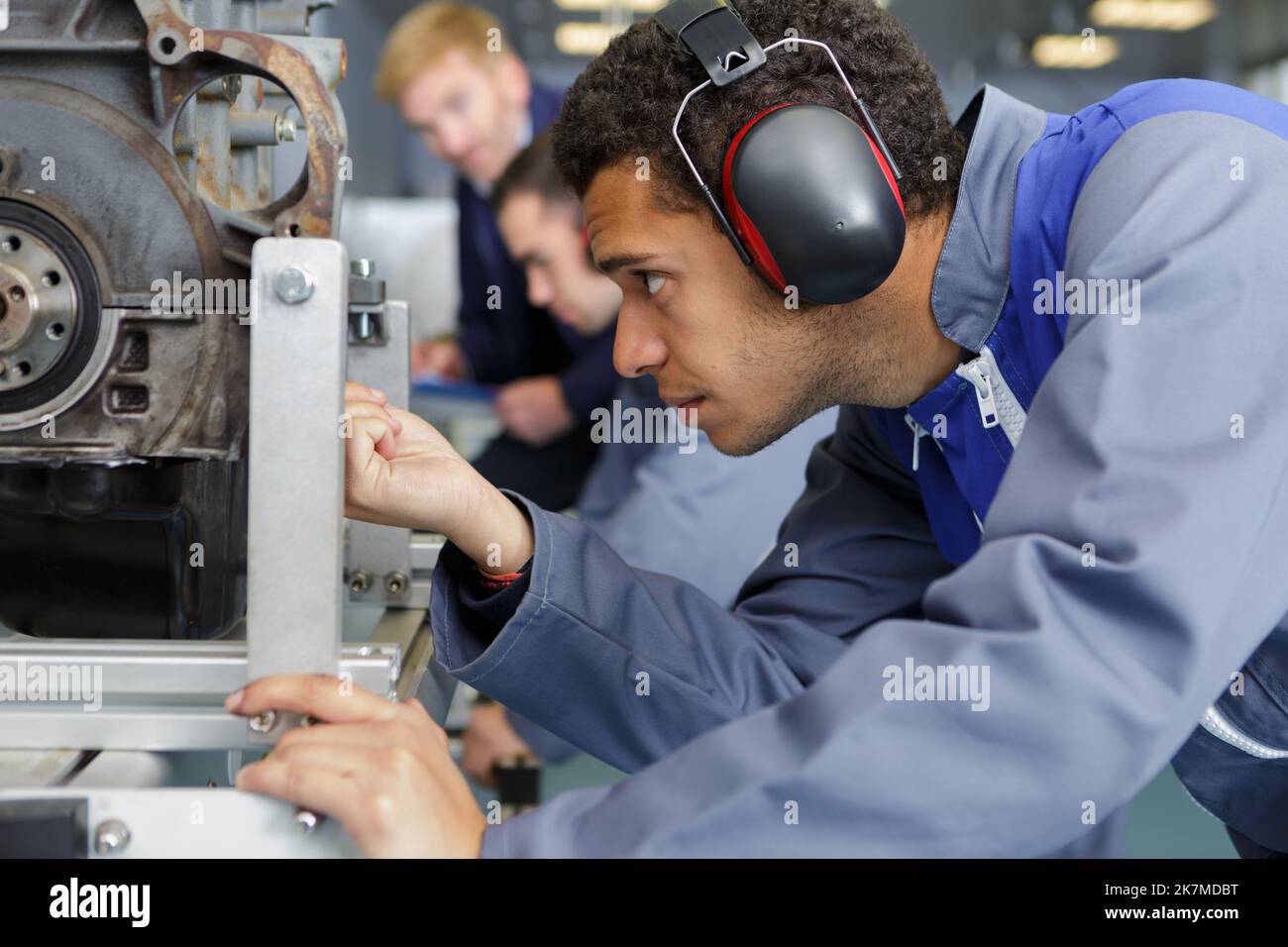 close up mechanical man using tool Stock Photo - Alamy