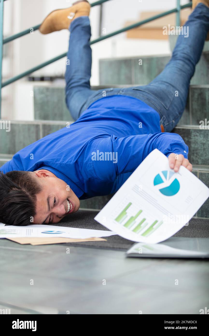 office worker felling off the stairs Stock Photo - Alamy