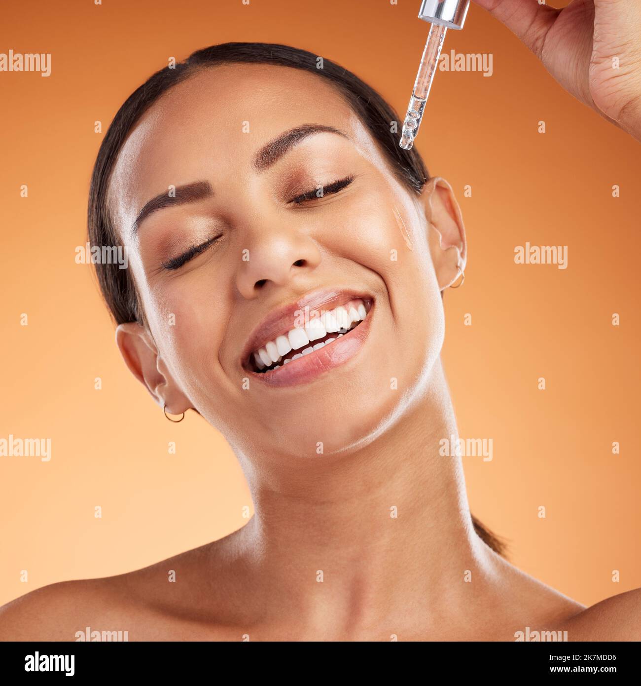 Face, skincare and beauty with a black woman using serum for antiaging ...