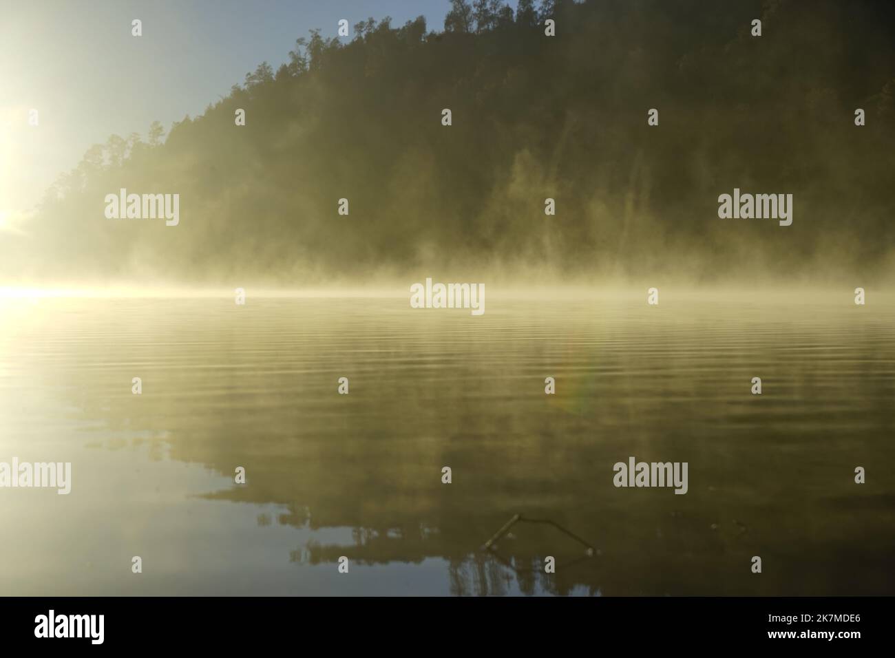 Panorama of mountains lake, foggy with sunlight in the morning at ...