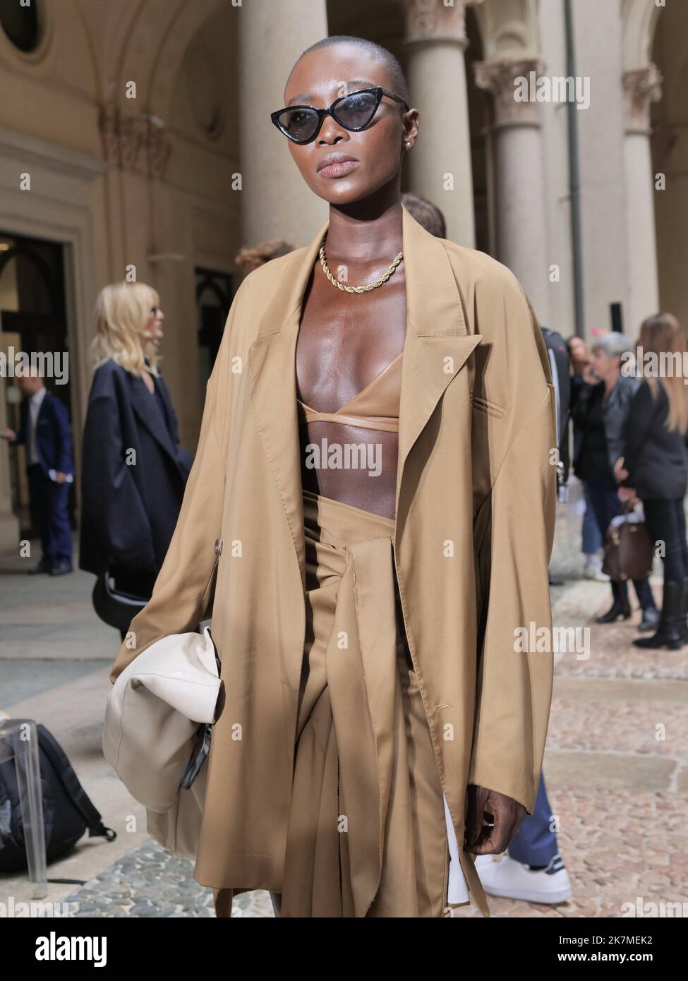 Fashionable woman posing for photographers after Calcaterra fashion ...