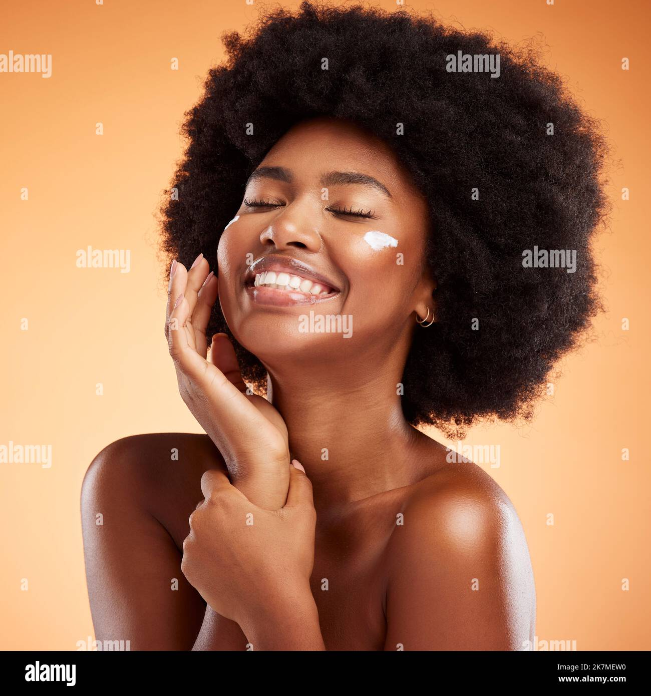 Beauty, skincare and black woman with a facial product or cream on her ...