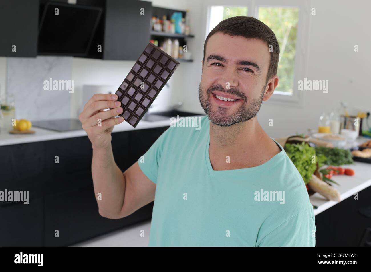 Man chocolate bar hi-res stock photography and images - Alamy