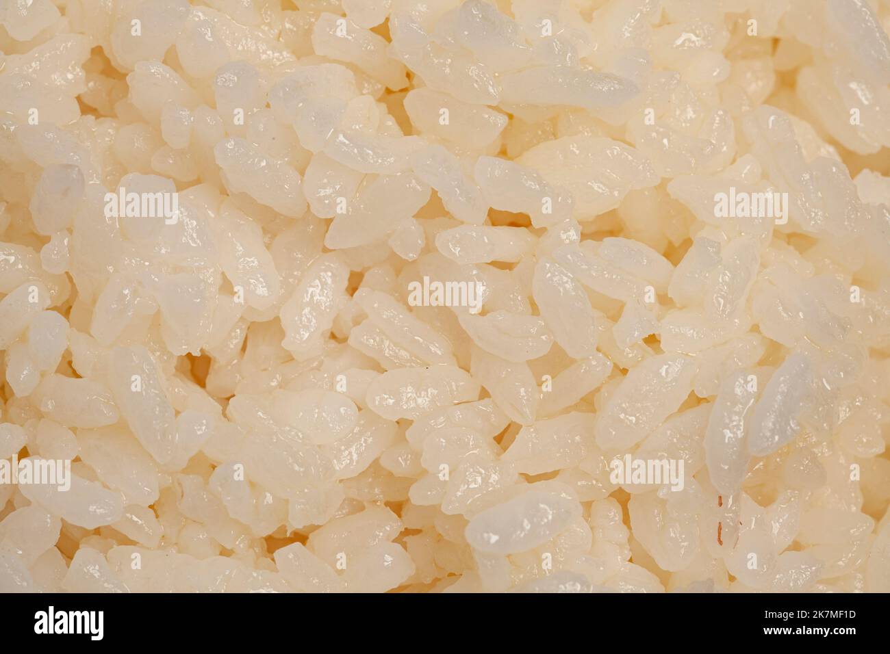 boiled rice macro texture background Stock Photo - Alamy