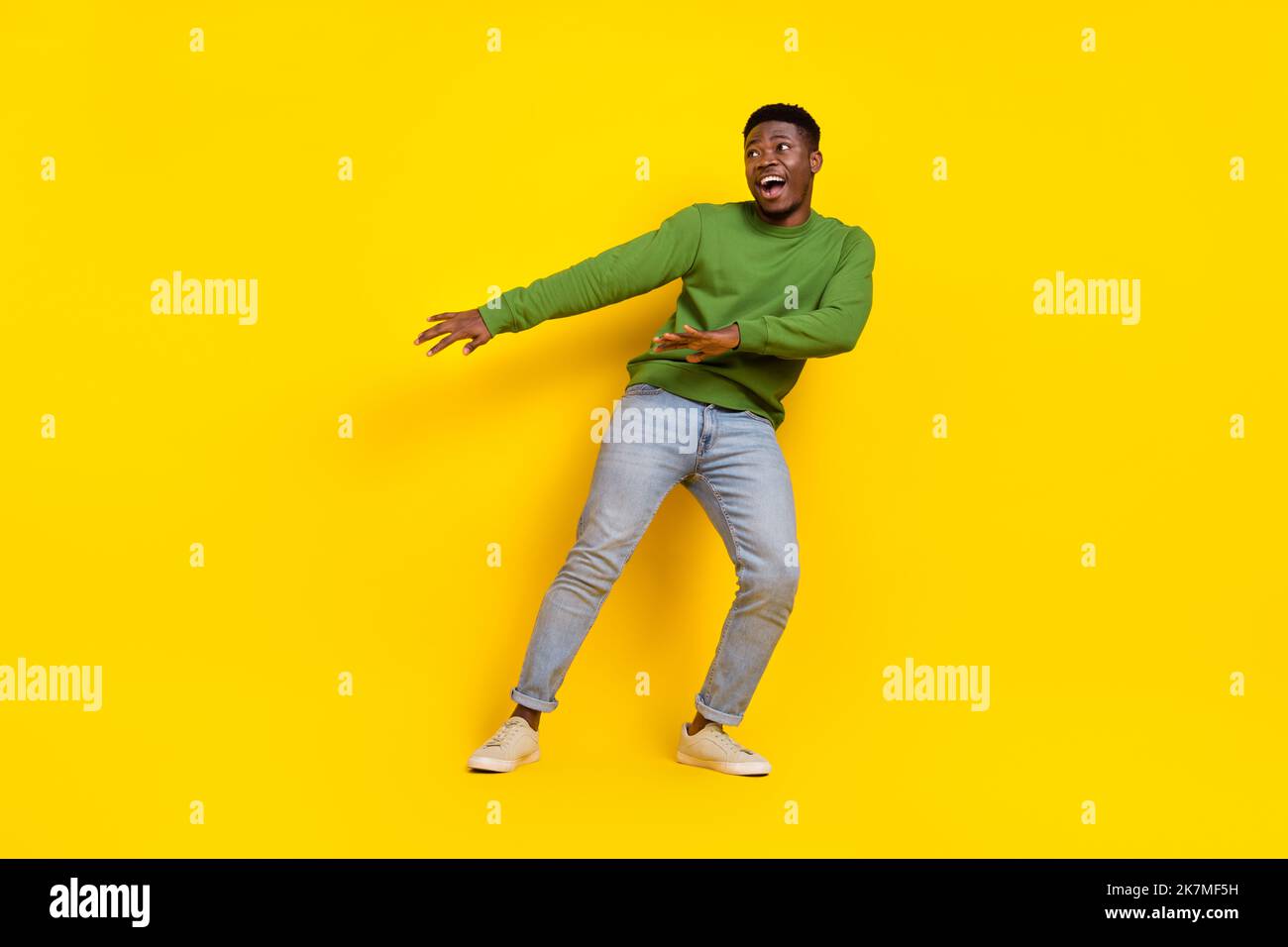 Full length body size view of attractive funky cheerful guy dancing ...