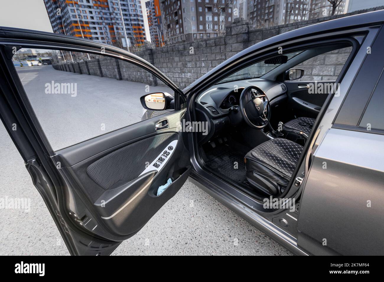 Open driver's door of a Hyundai Accent with a view of the salon Stock ...