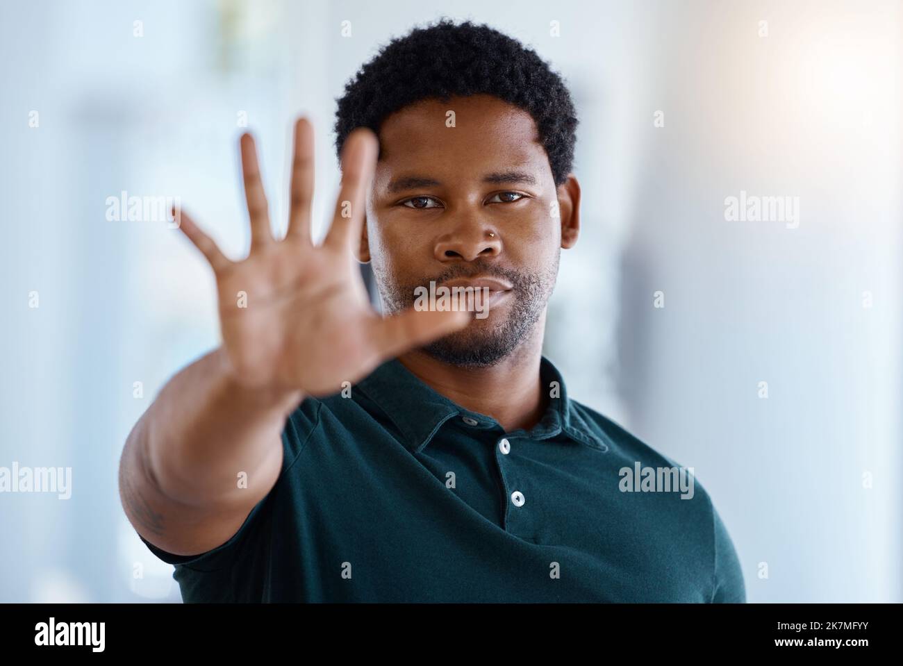 Black man, hands and stop or five gesture for sign, warning or halt ...