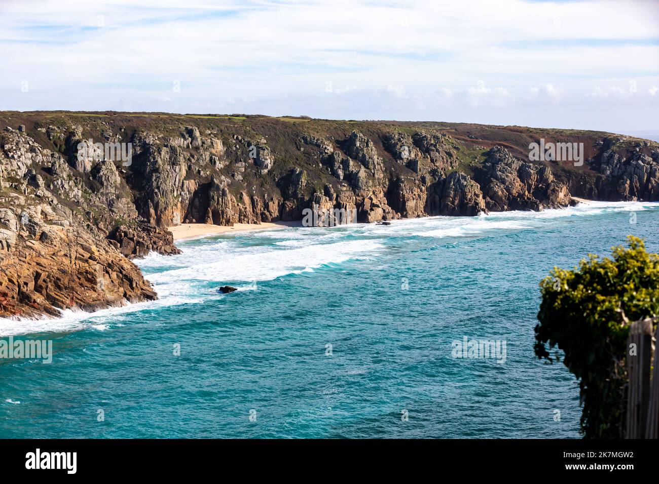 Sunshine over the cliffs and sea in Porthcurno, Cornwall,UK Stock Photo ...