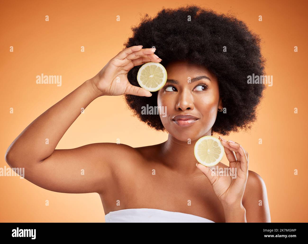 Skincare, makeup and beauty black woman with lemon for diy facial ...