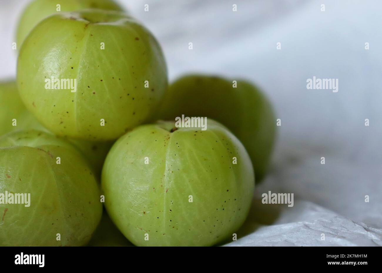 Close-up of Indian Gooseberry/Amla against white background Stock Photo ...