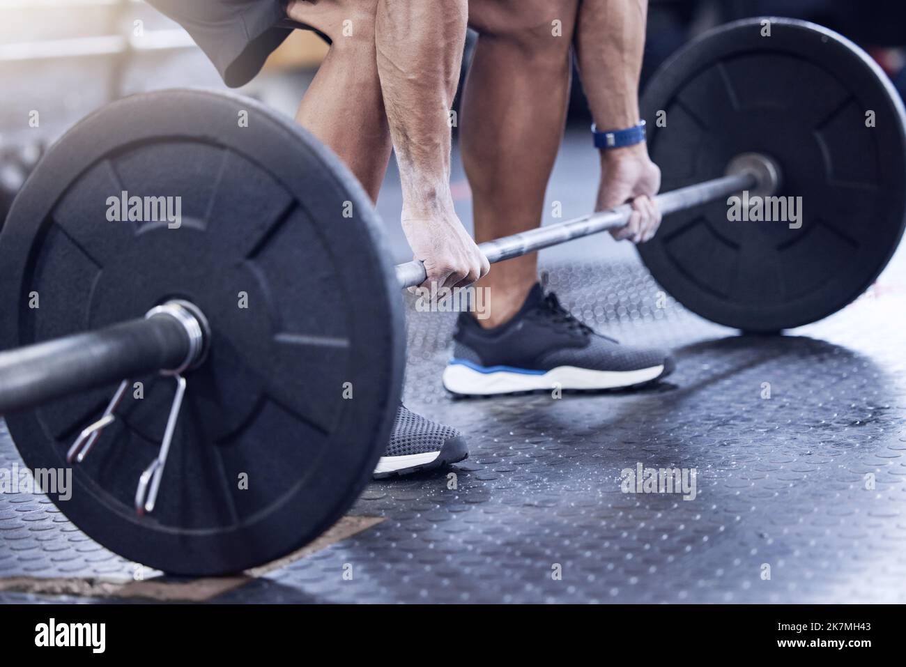 Nothing is too heavy that I cant lift. an unrecognisable man working ...
