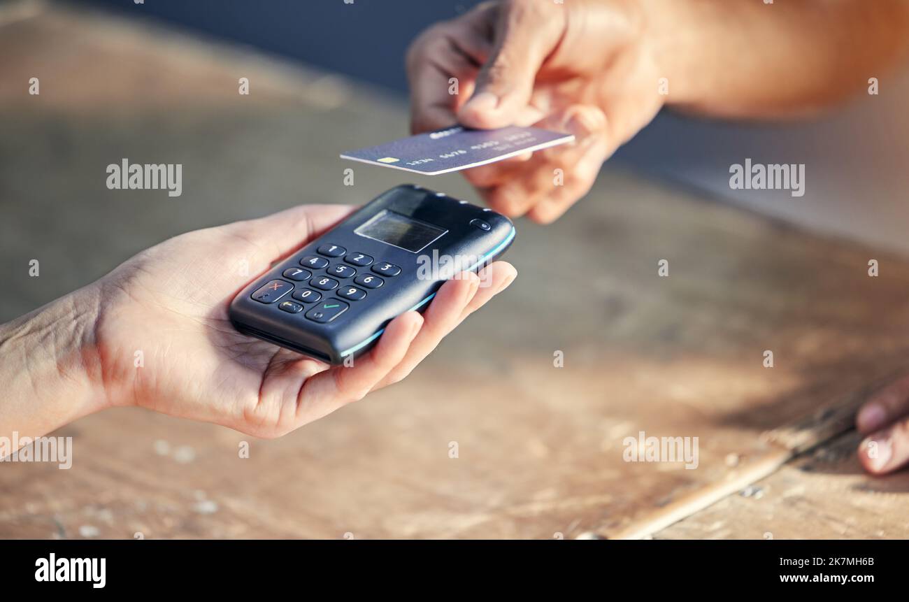 Just tap and youre good to go. Closeup shot of an unrecognisable person ...