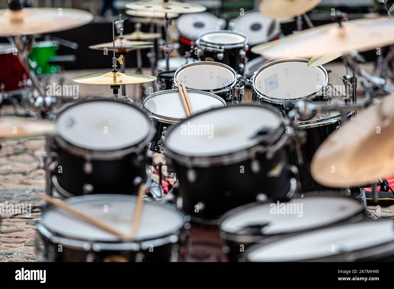 A set of plates in a drum set. At a concert of percussion music ...