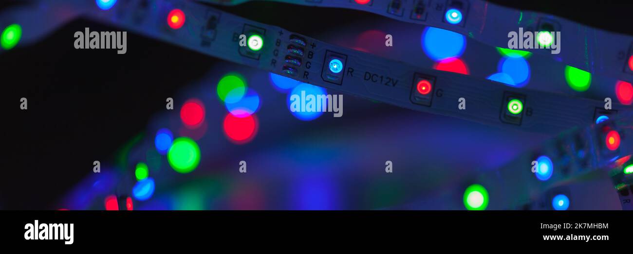 Colorful LED strip lights, panoramic background photo with selective ...