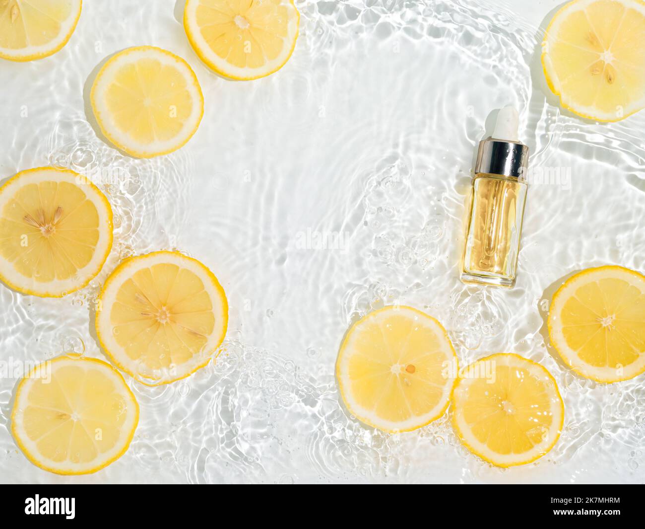 Luxury cosmetic peeling or serum in glass bottle with pipette in clean ...