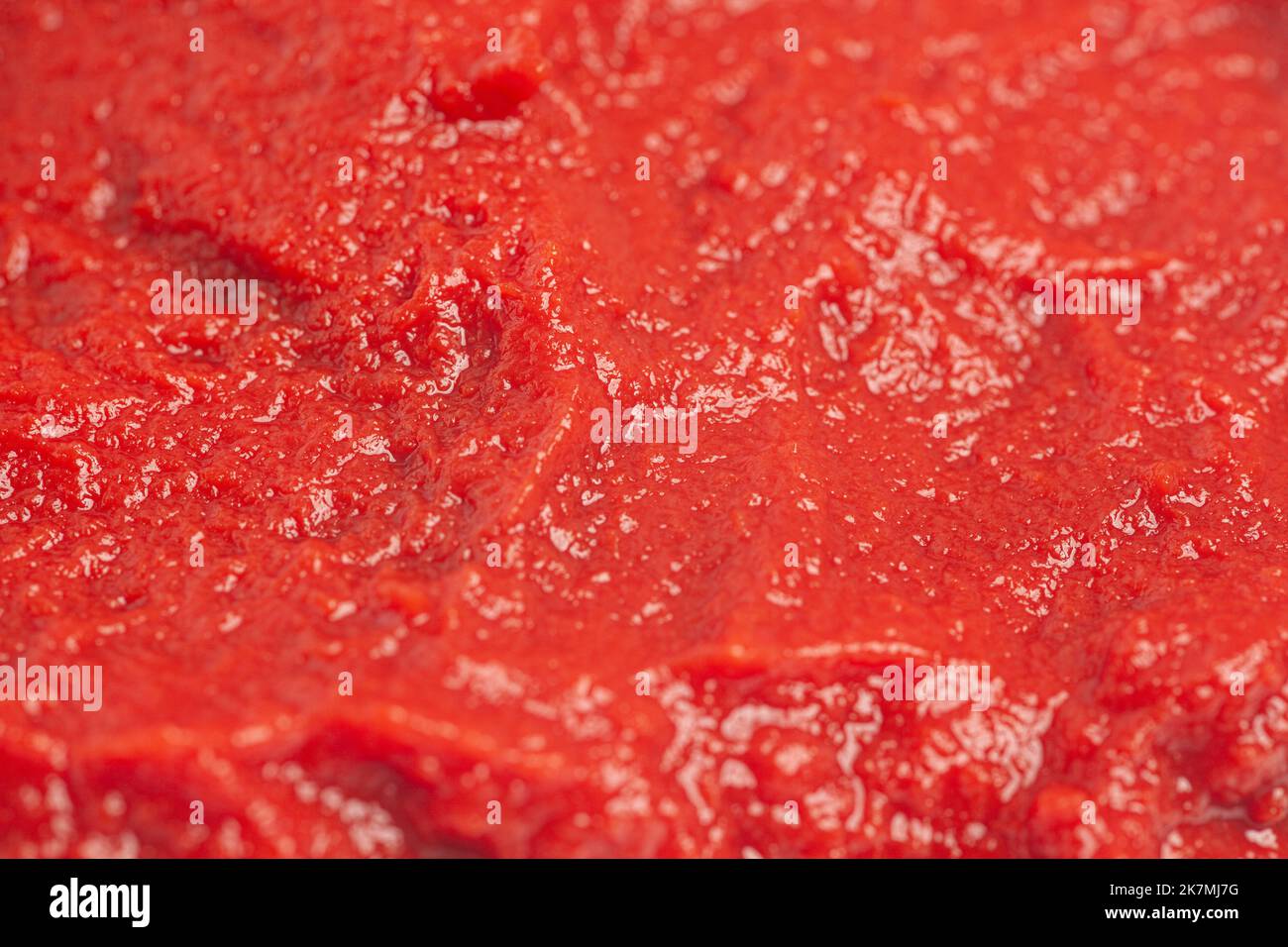 Tomato paste texture background close-up Stock Photo - Alamy