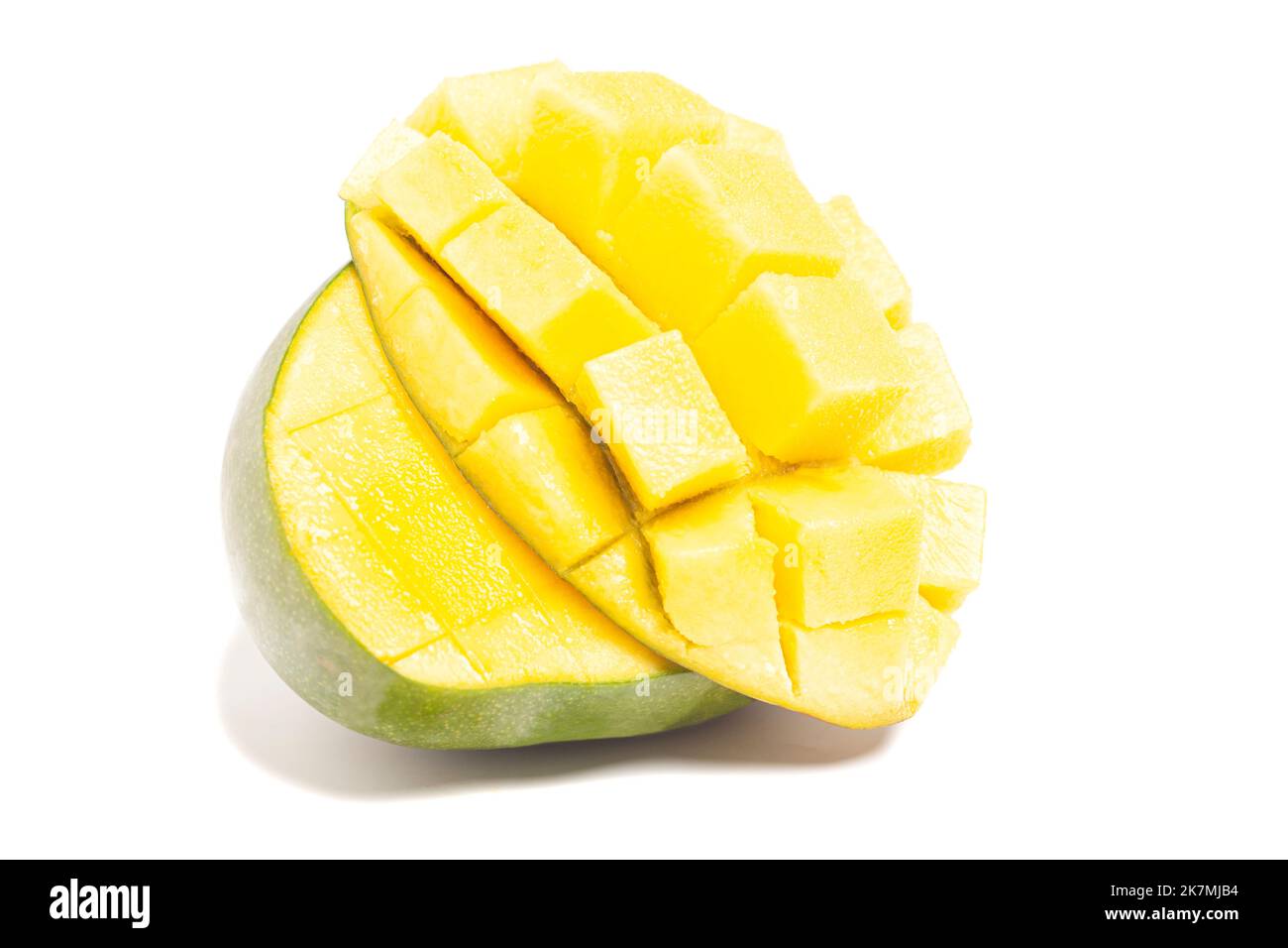 chopped half of ripe mango fruit isolated on white background Stock ...
